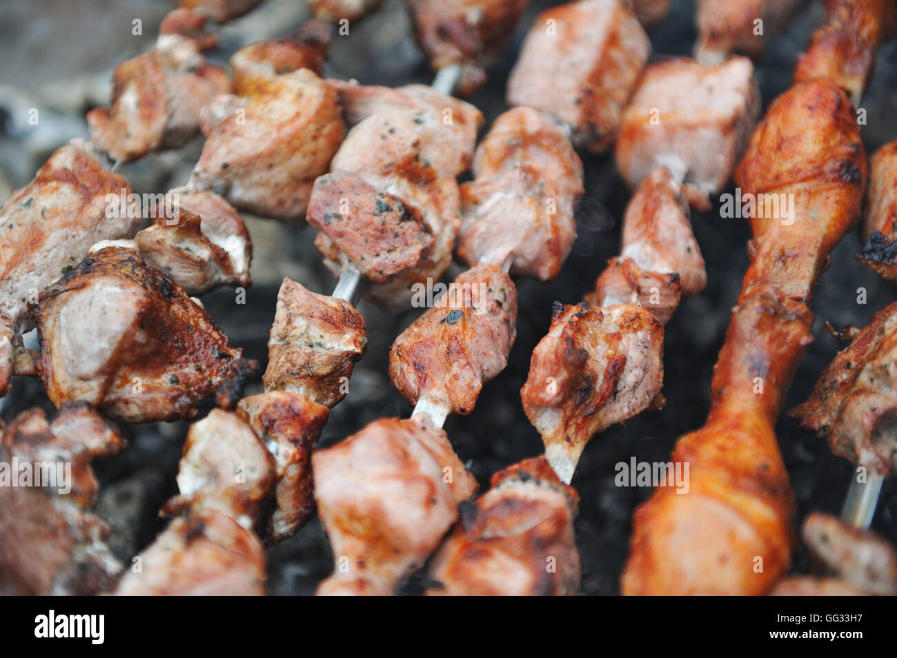 Close up of pork and chicken meat shashlik Stock Photo - Alamy