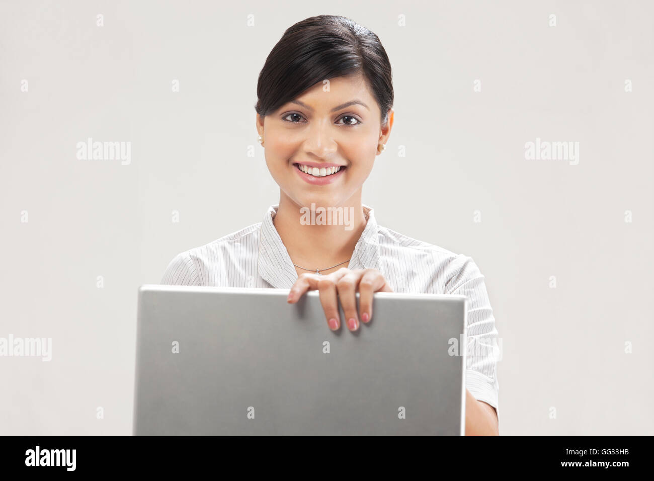 Portrait of Indian businesswoman using laptop Stock Photo - Alamy