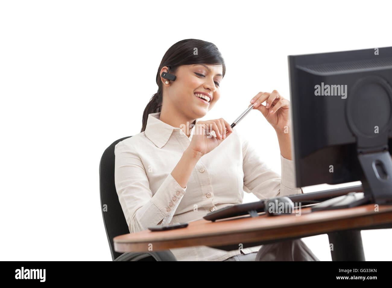 Female professional on call with desktop Stock Photo - Alamy