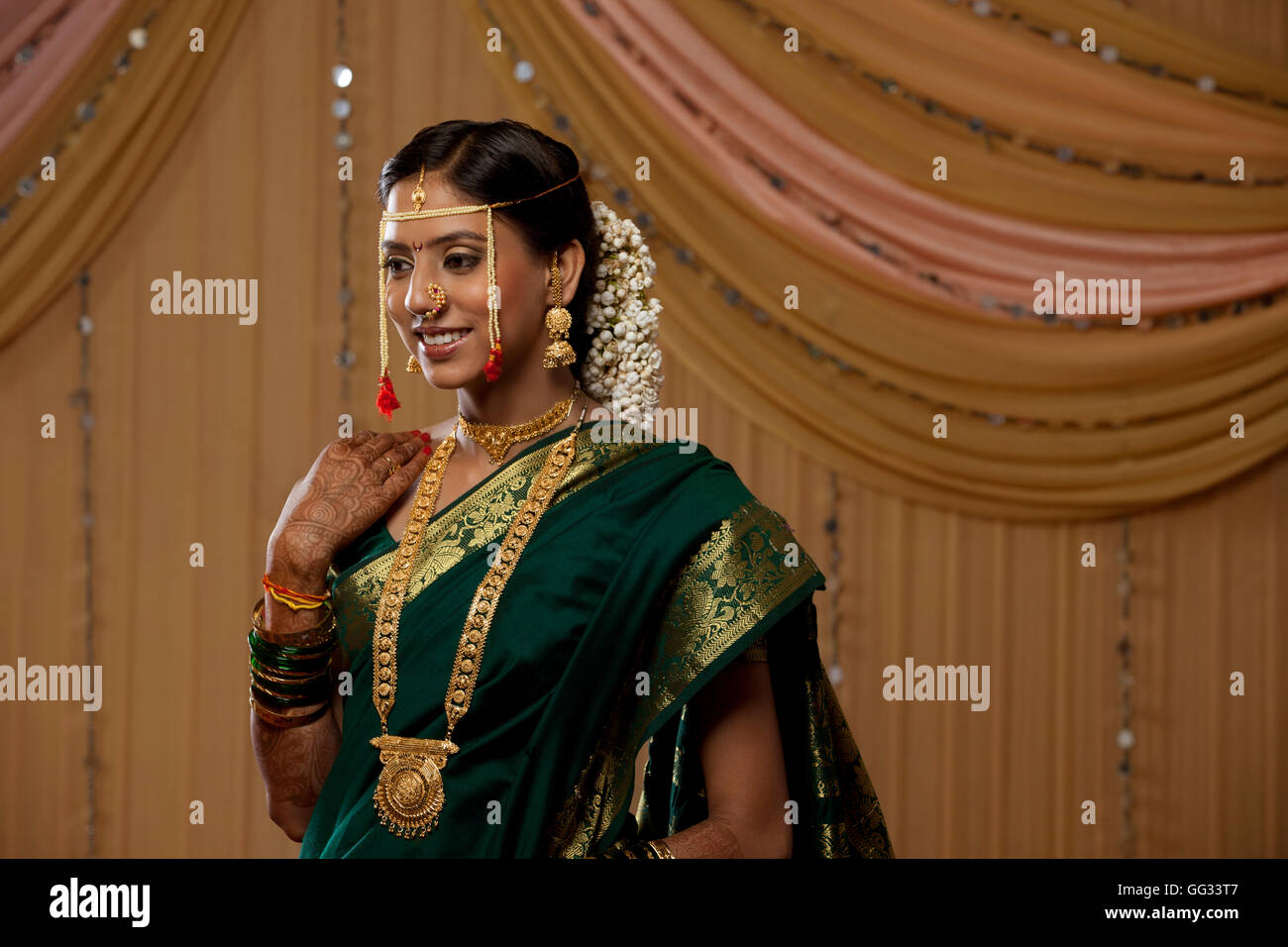 Pretty young bride smiling Stock Photo - Alamy