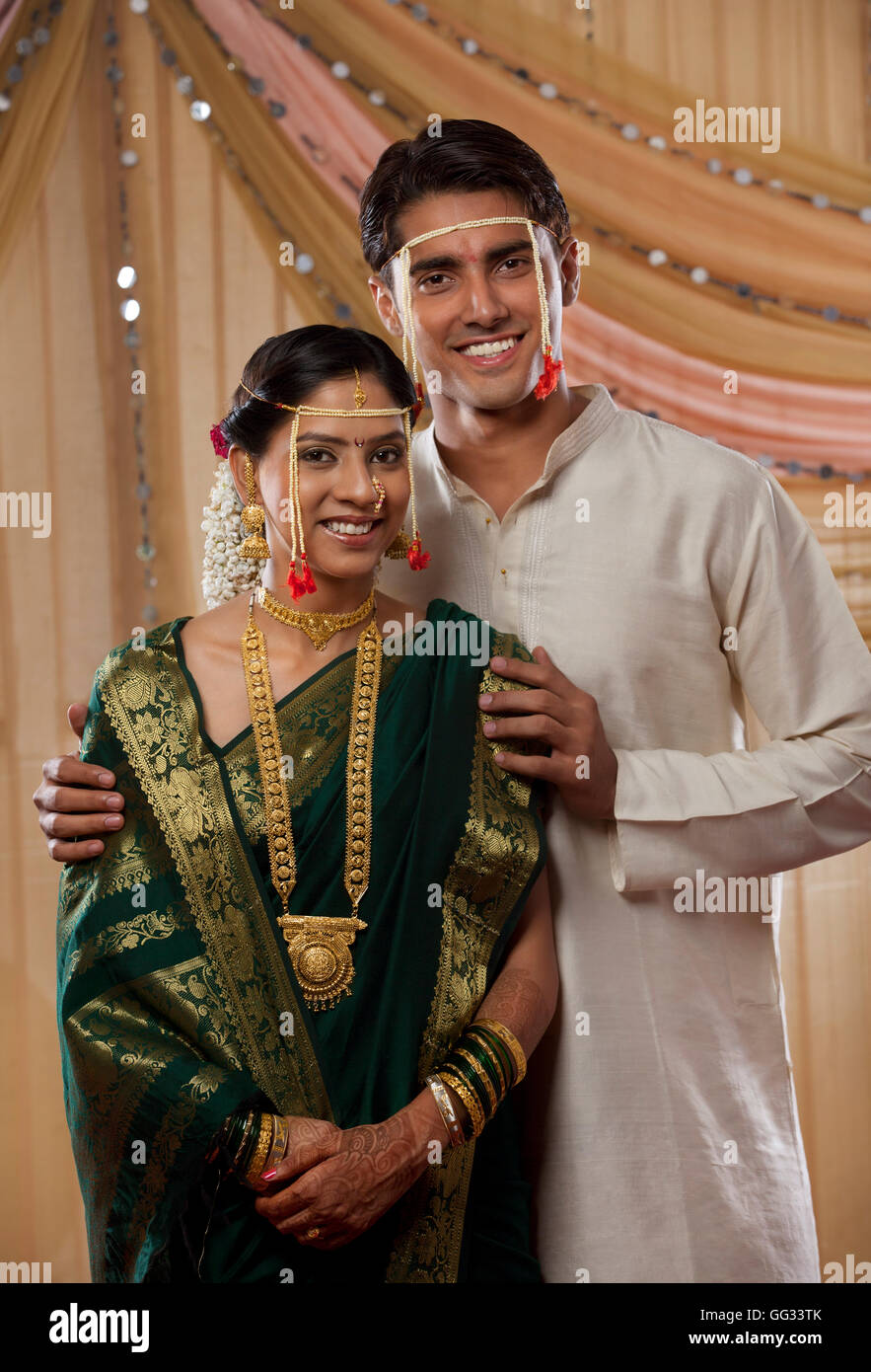Young bride and groom smiling together on wedding day Stock Photo - Alamy