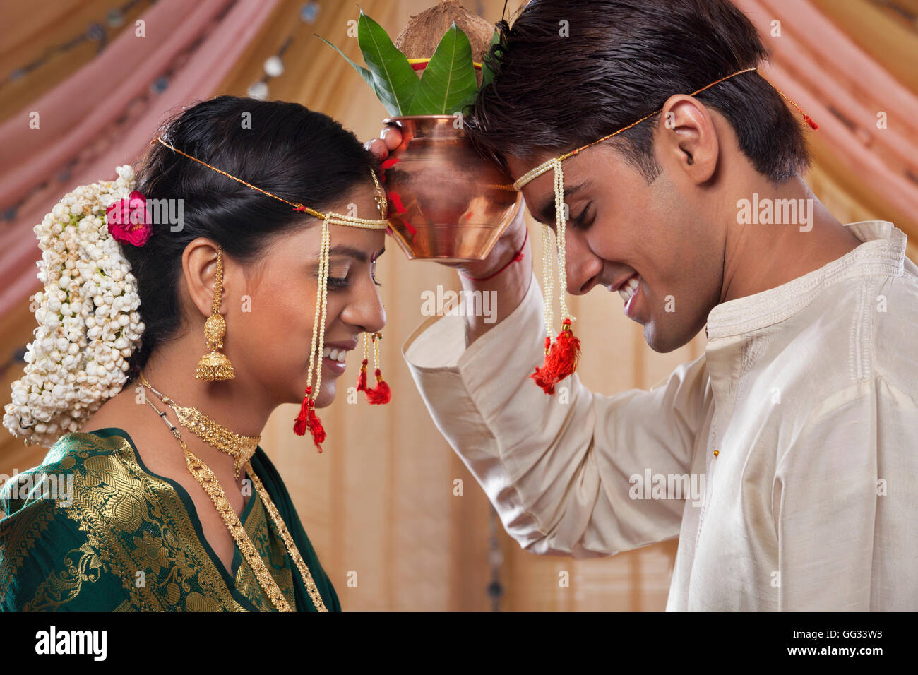 Indian wedding rituals coconut hi-res stock photography and images - Alamy