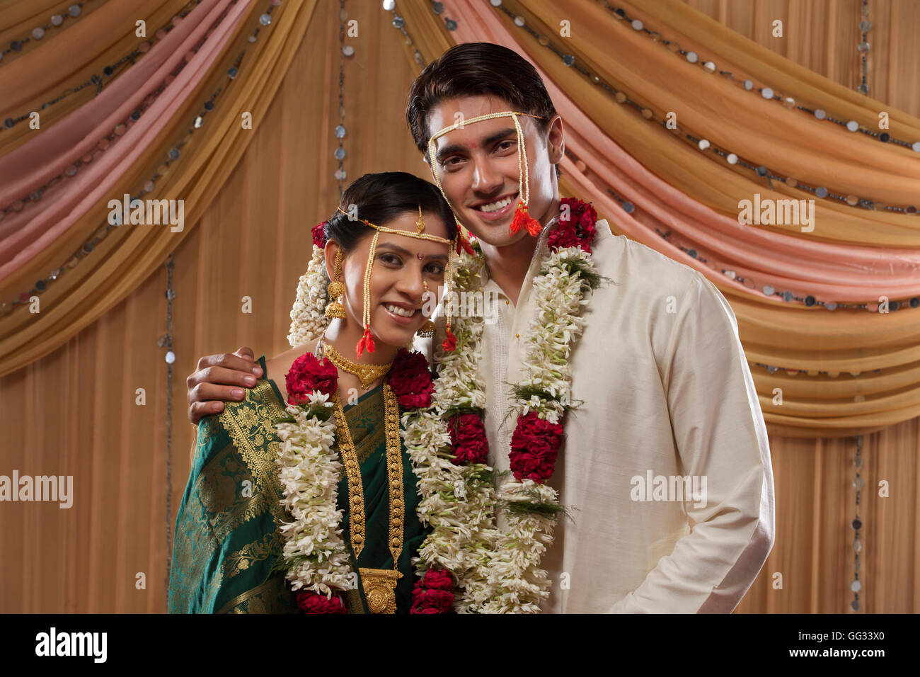 Portrait of happy newly married couple smiling together Stock Photo - Alamy