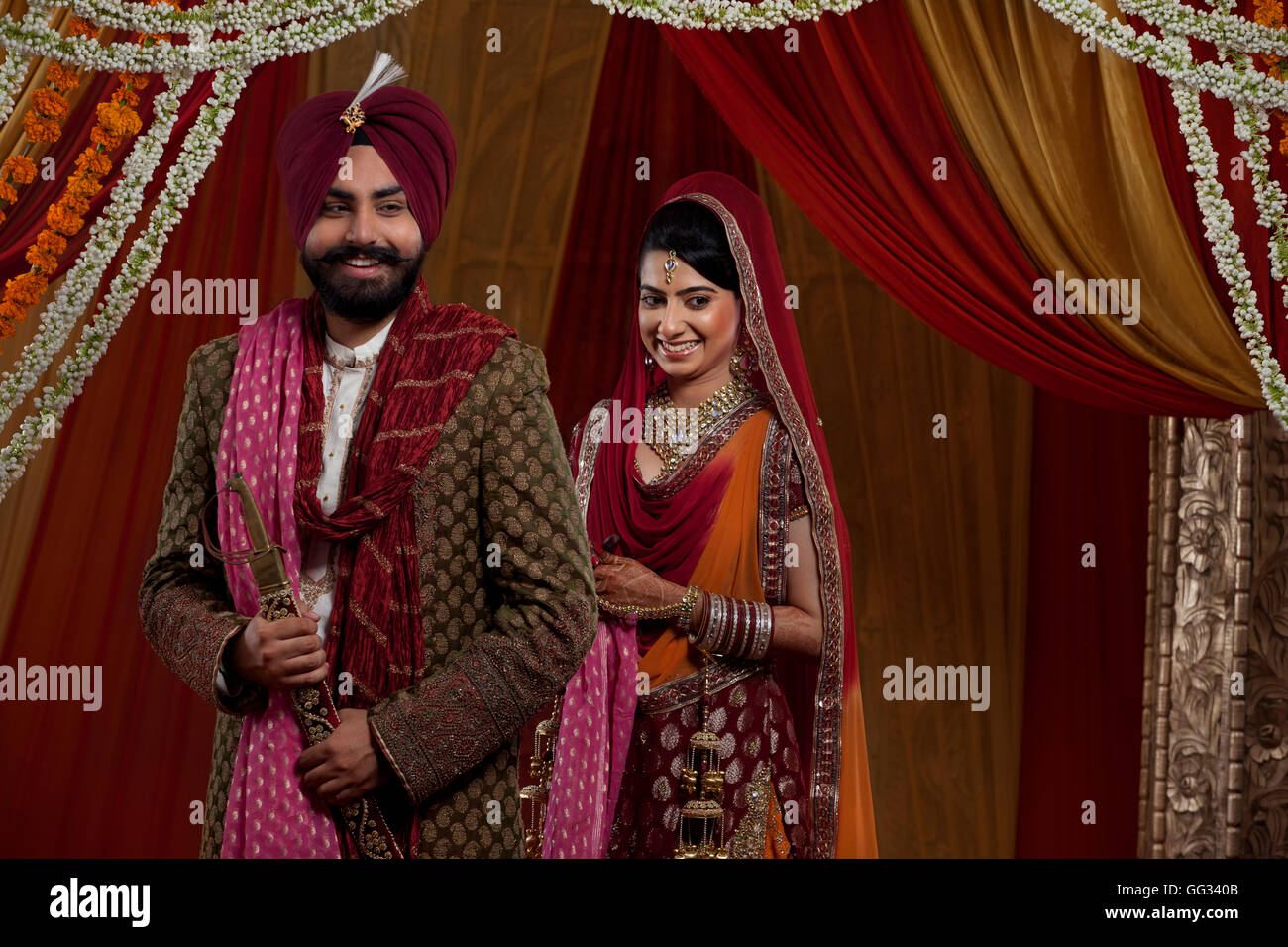 Sikh bride and groom standing together Stock Photo - Alamy