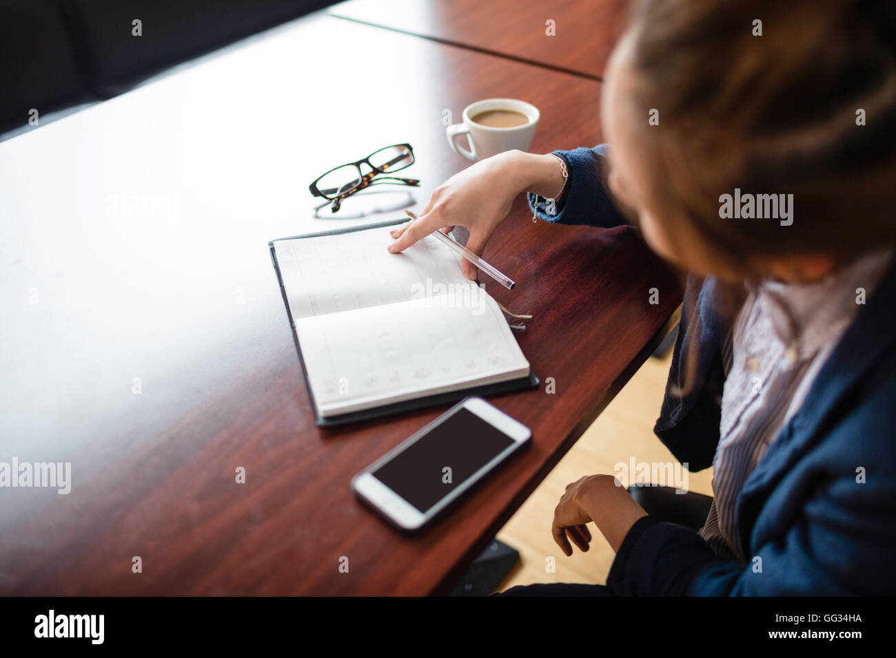 Writing her diary hi-res stock photography and images - Alamy
