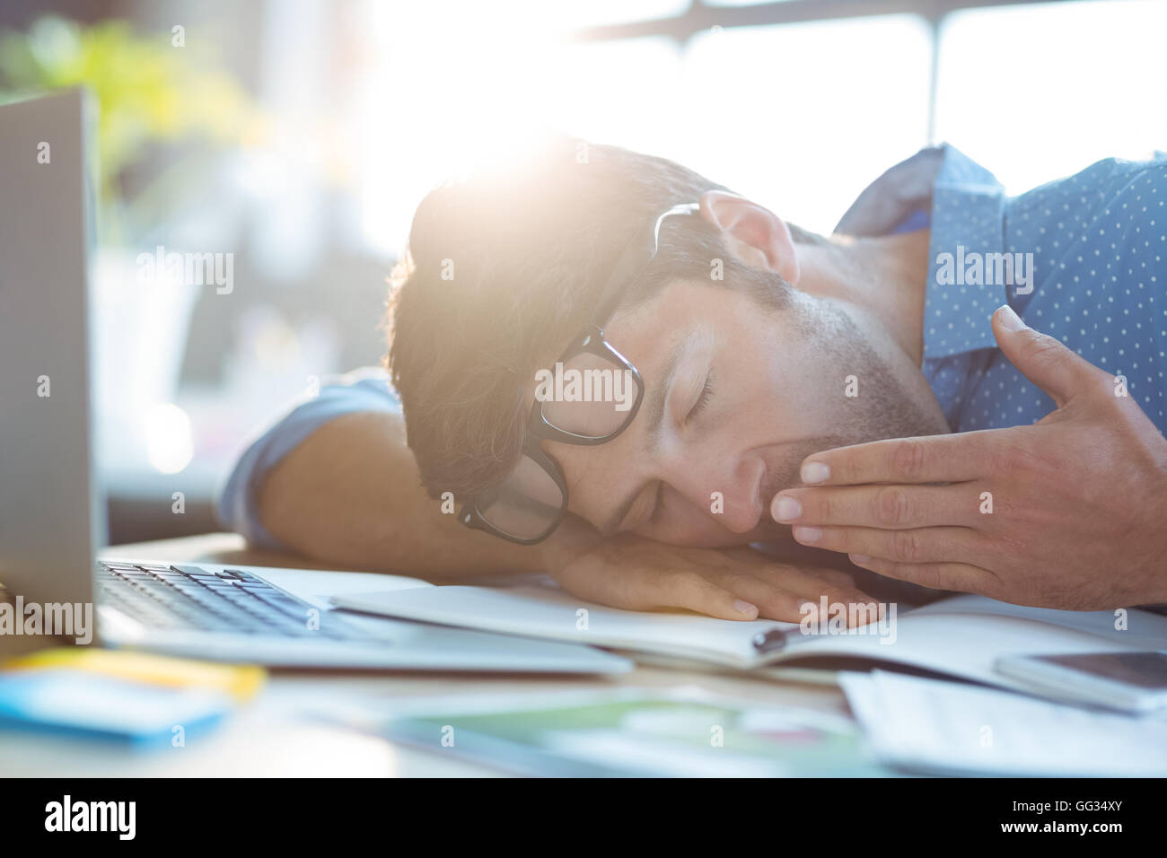 Male business executive yawning Stock Photo - Alamy