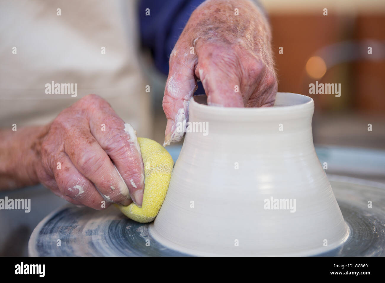 Close-up of potter making pot Stock Photo - Alamy