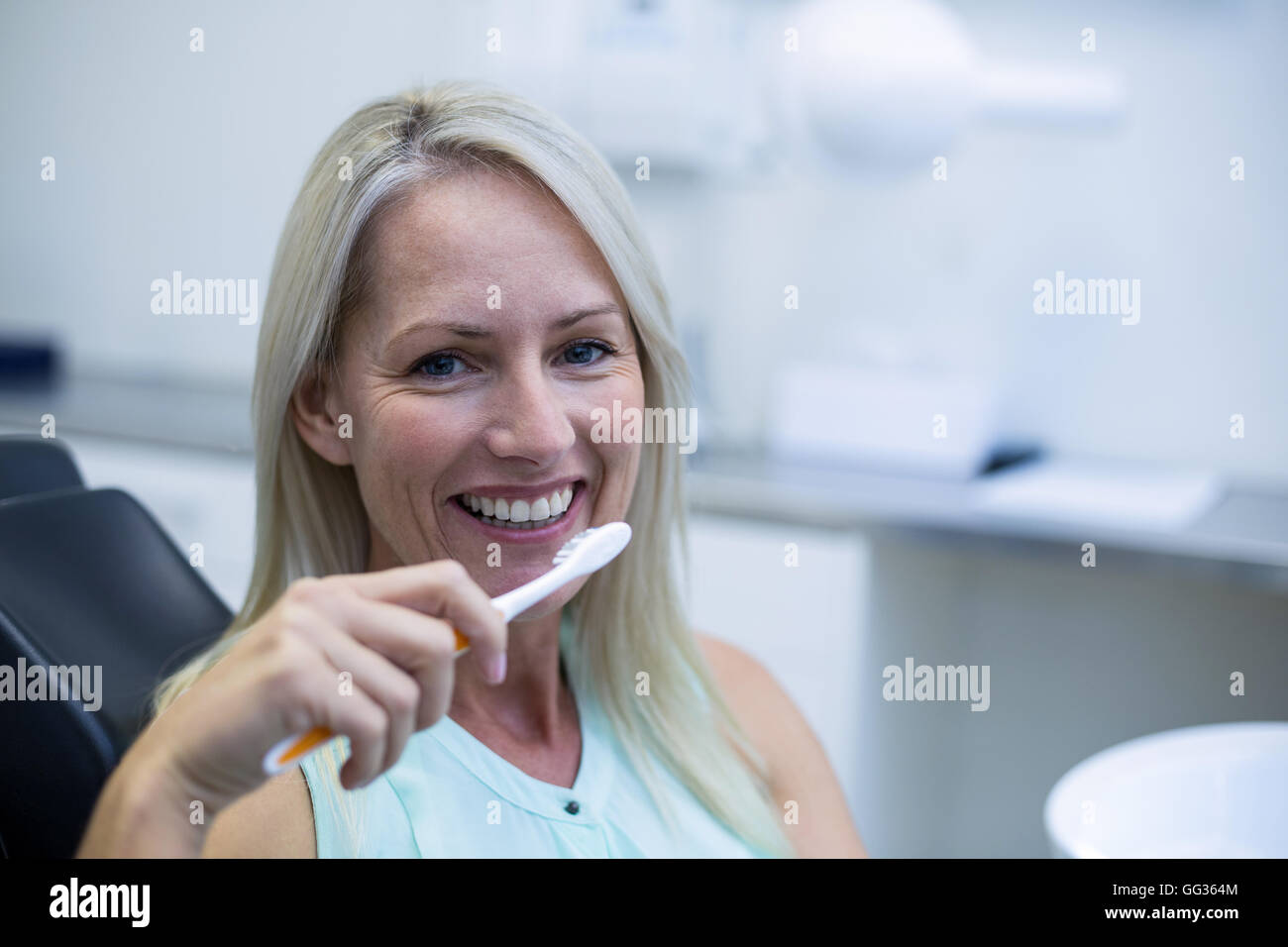 Holding tooth hi-res stock photography and images - Alamy