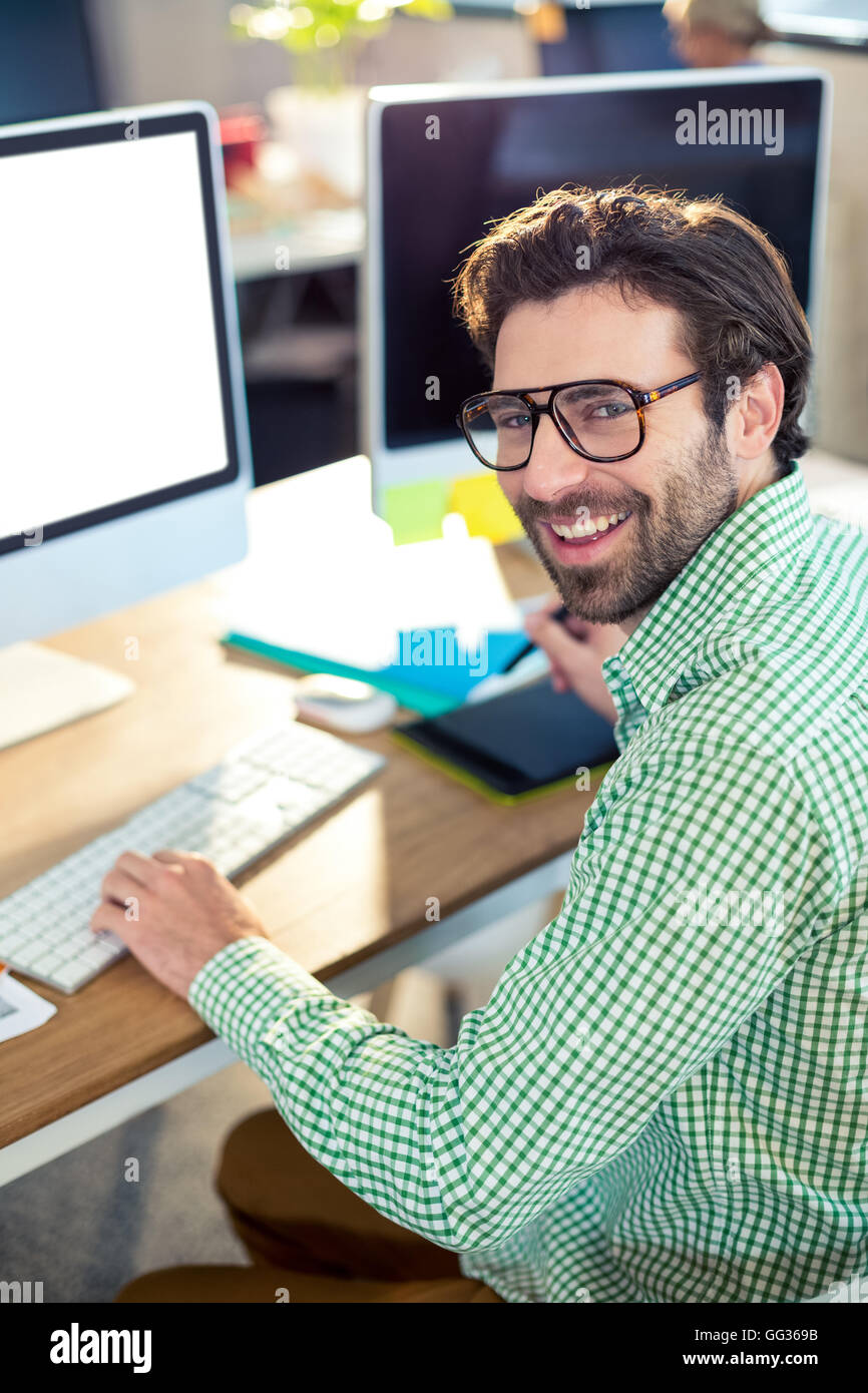 Graphic designer working on computer Stock Photo - Alamy
