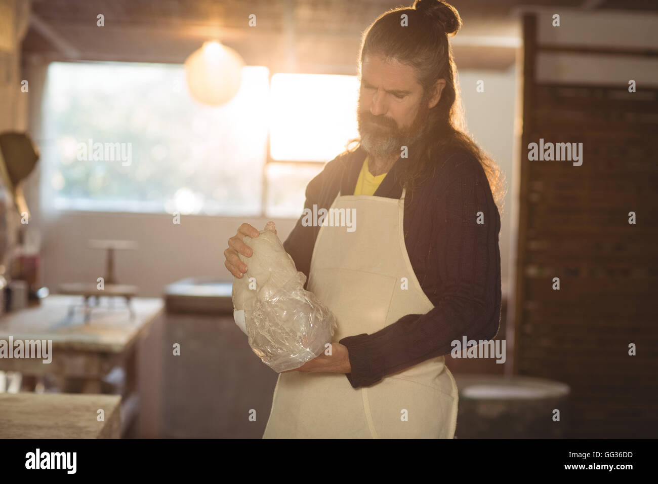 Plastic apron hi-res stock photography and images - Alamy