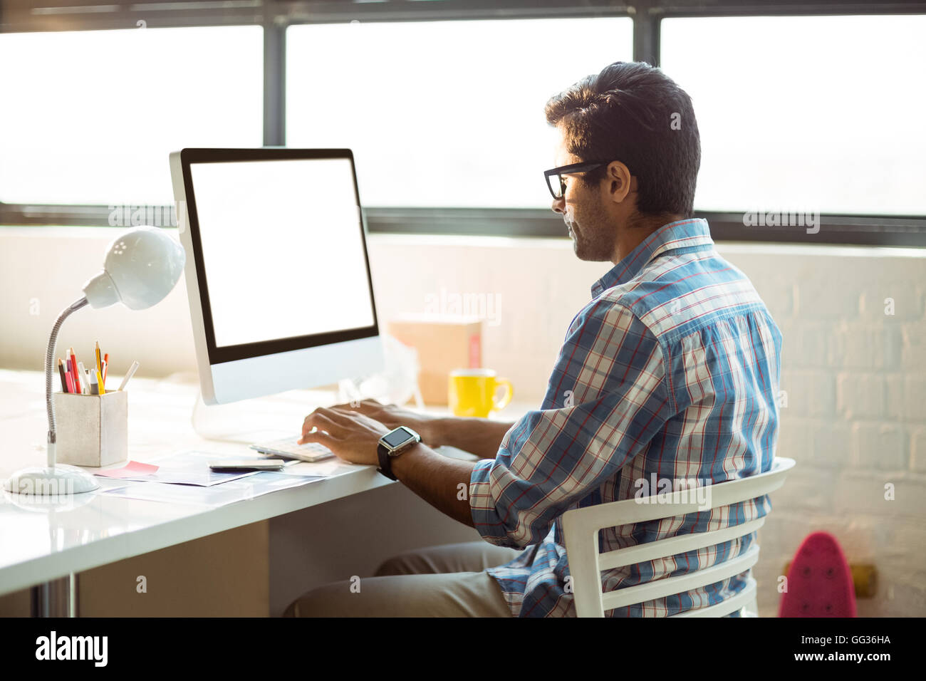 Business executive working on computer Stock Photo - Alamy