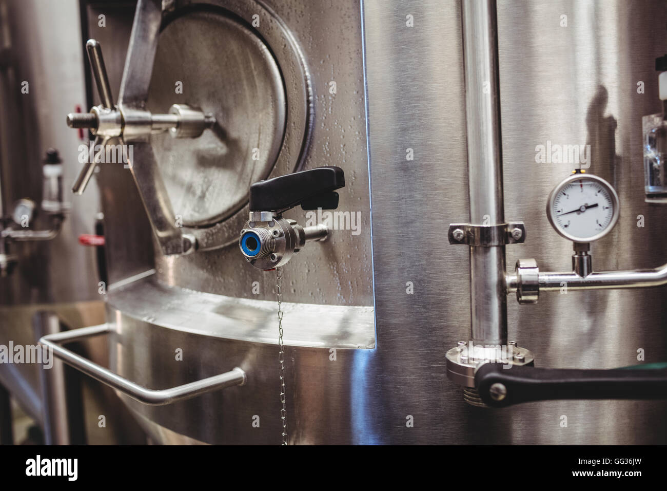 Storage tank at distillery Stock Photo - Alamy