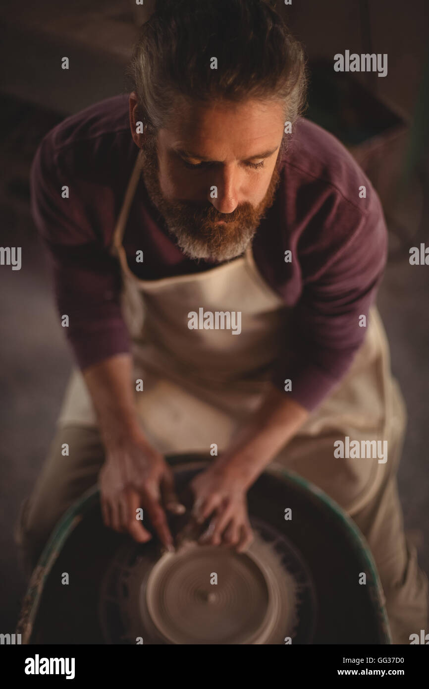 Male potter making a pot Stock Photo - Alamy