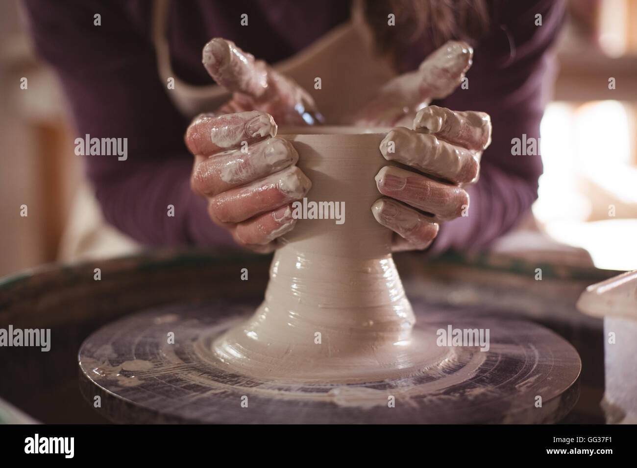 Male potter making pot Stock Photo - Alamy