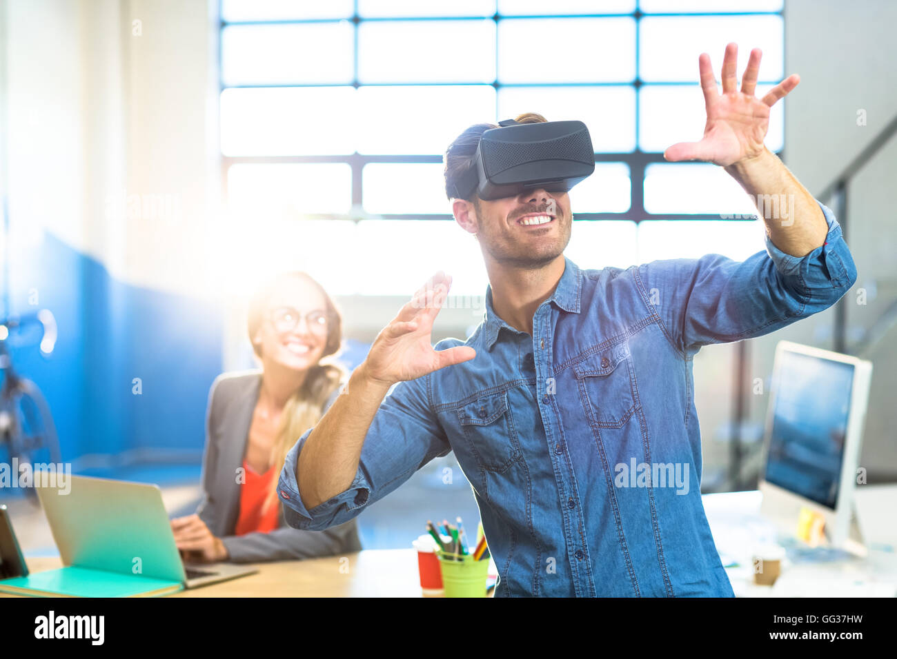 Male graphic designer using the virtual reality headset Stock Photo - Alamy