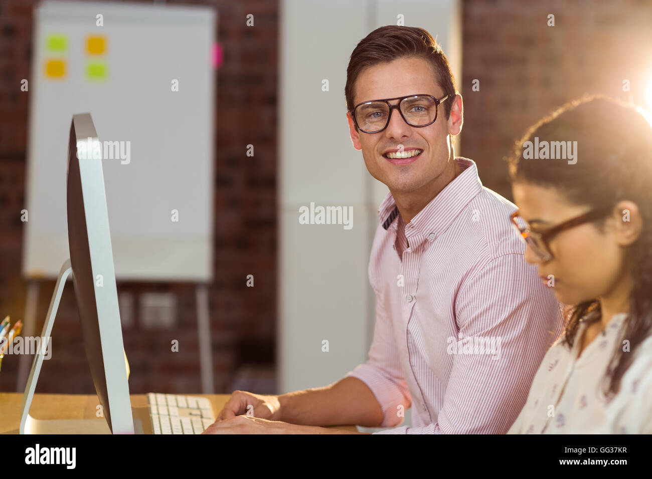 Man working on computer Stock Photo - Alamy