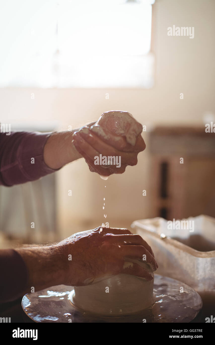 Male potter making pot Stock Photo - Alamy