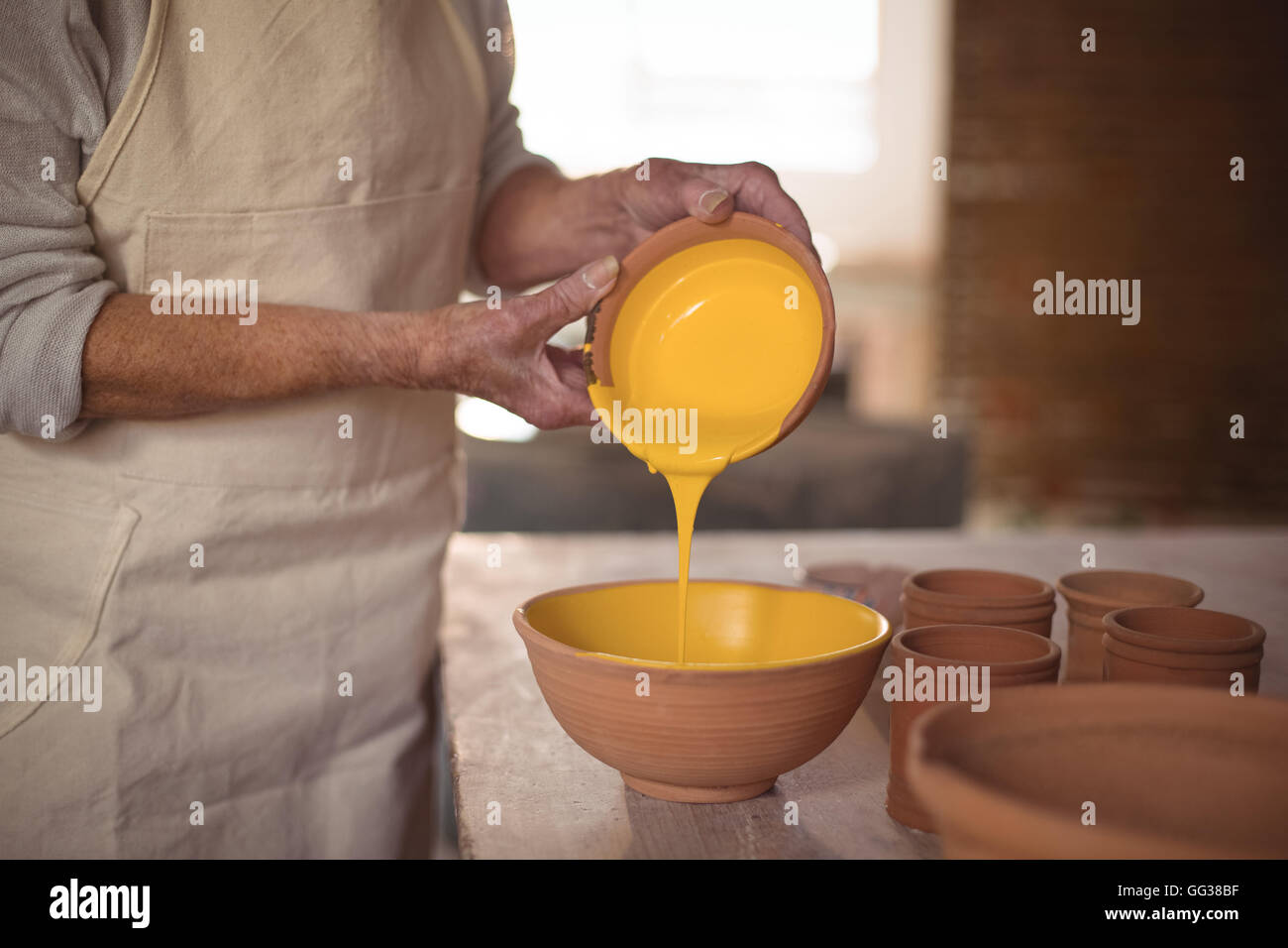 Pottery pouring hi-res stock photography and images - Alamy