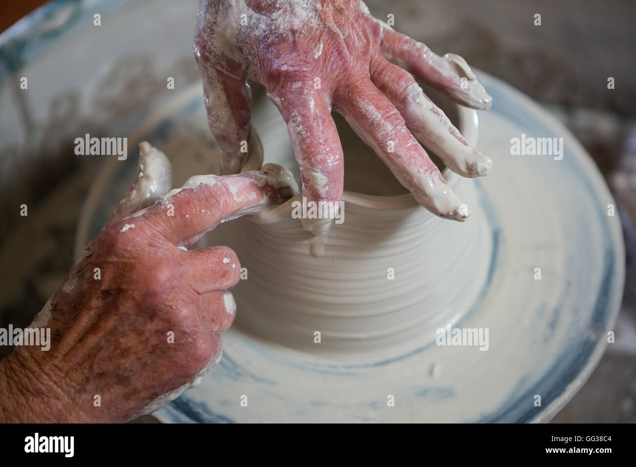 Close-up of potter making pot Stock Photo - Alamy