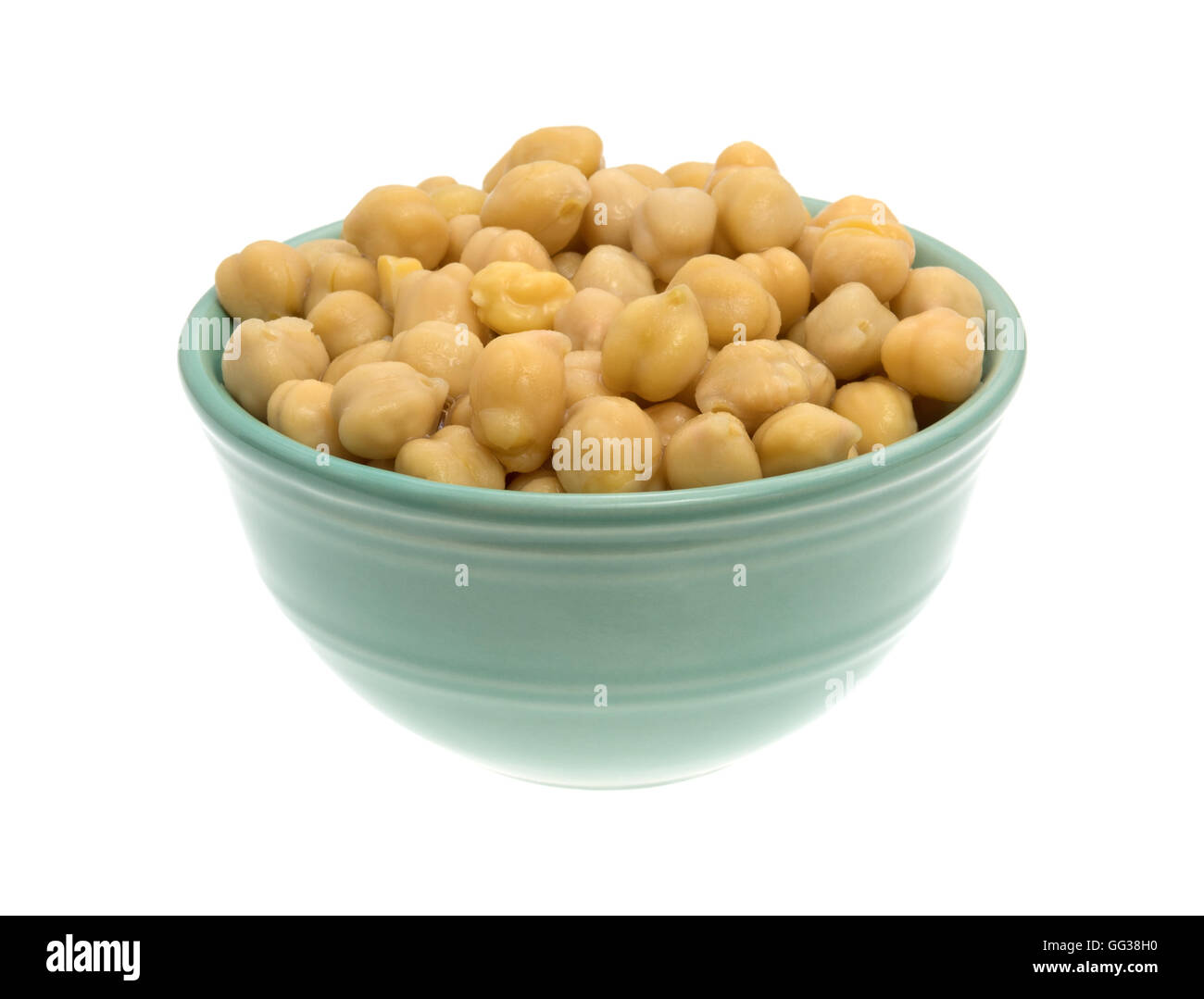 A bowl filled with organic garbanzo beans isolated on a white ...