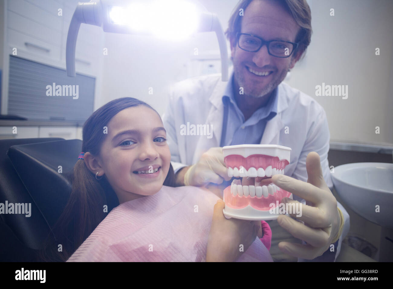 Dentist showing teeth girl hi-res stock photography and images - Alamy