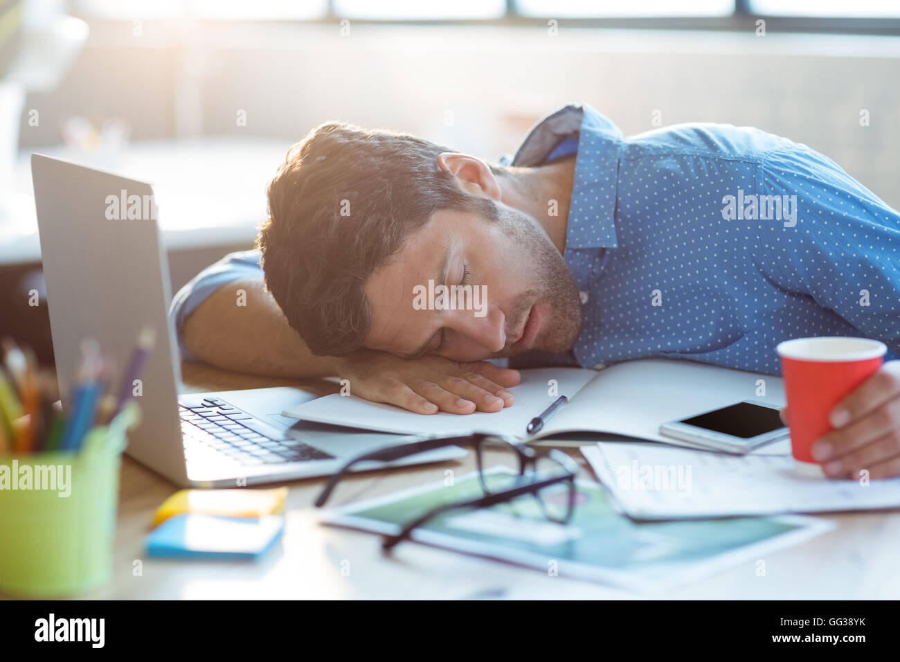 Male business executive sleeping Stock Photo - Alamy