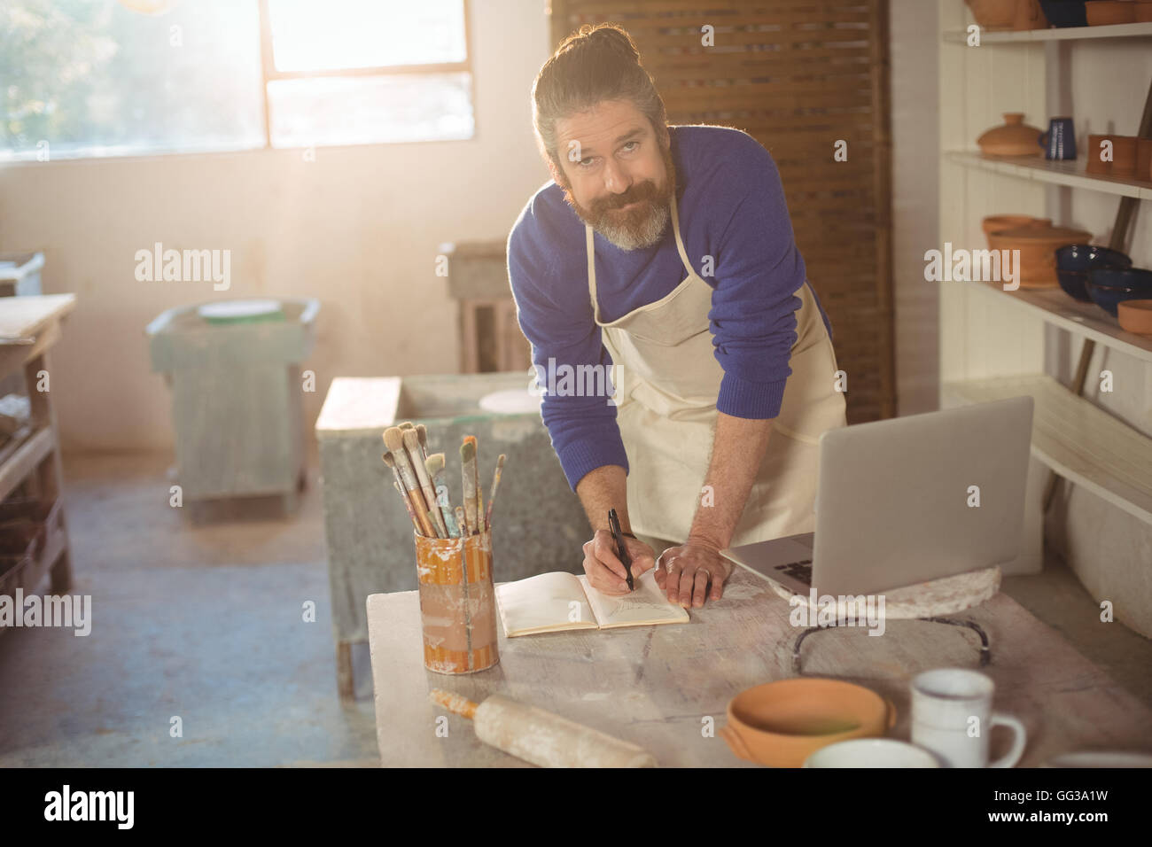 Male with book hi-res stock photography and images - Alamy