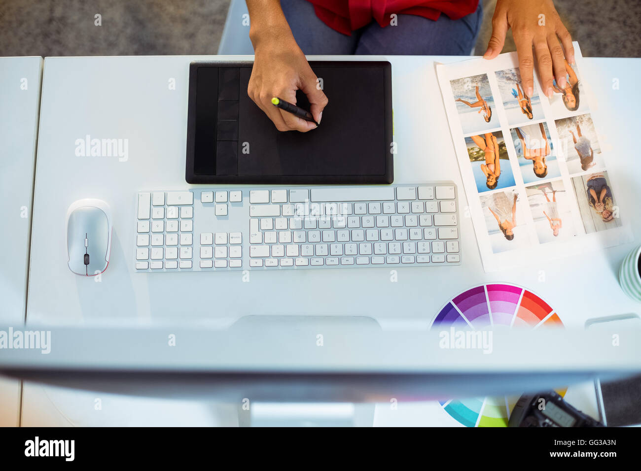 Graphic designer using graphics tablet Stock Photo - Alamy
