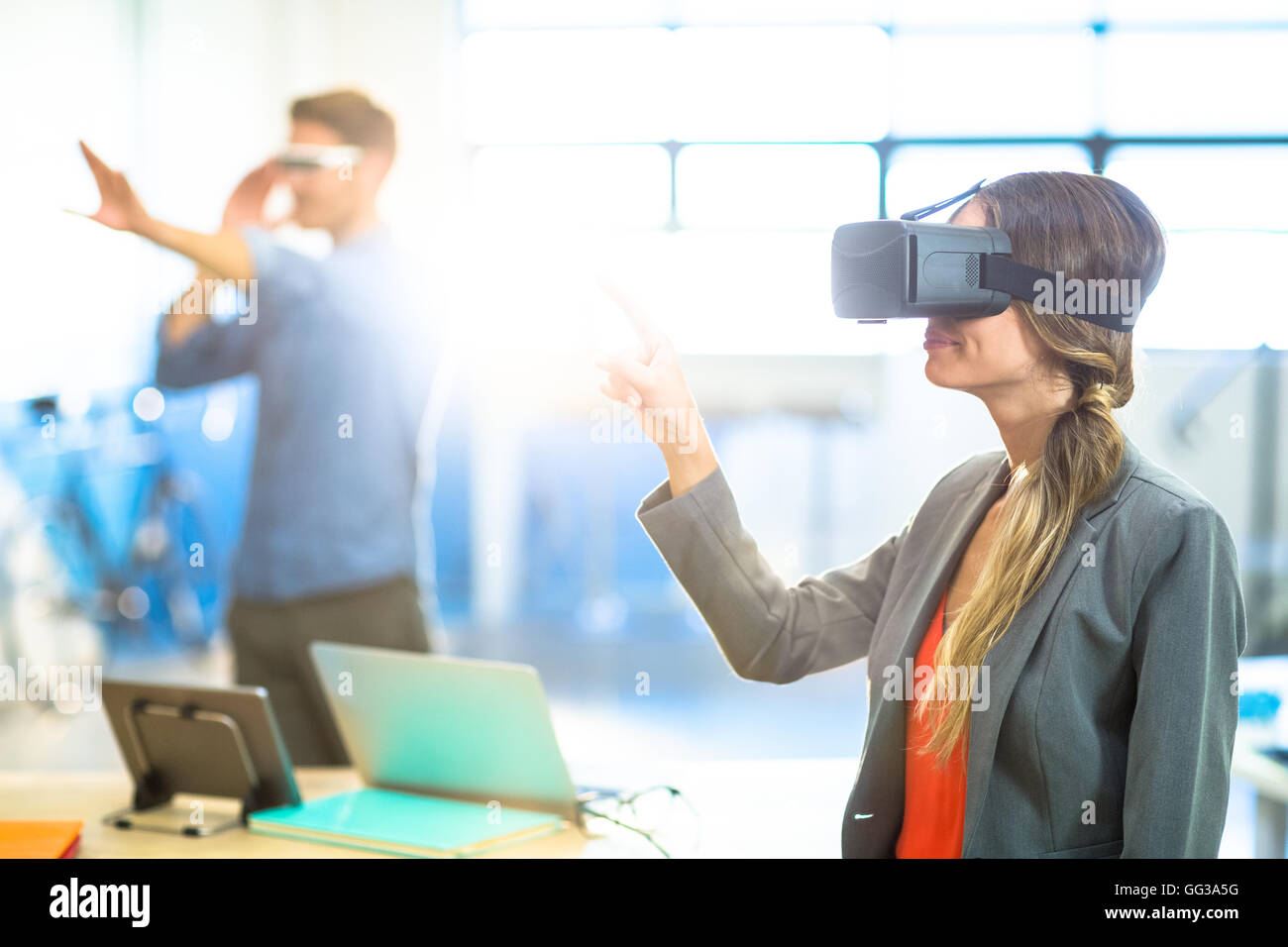 Female graphic designer using the virtual reality headset Stock Photo ...