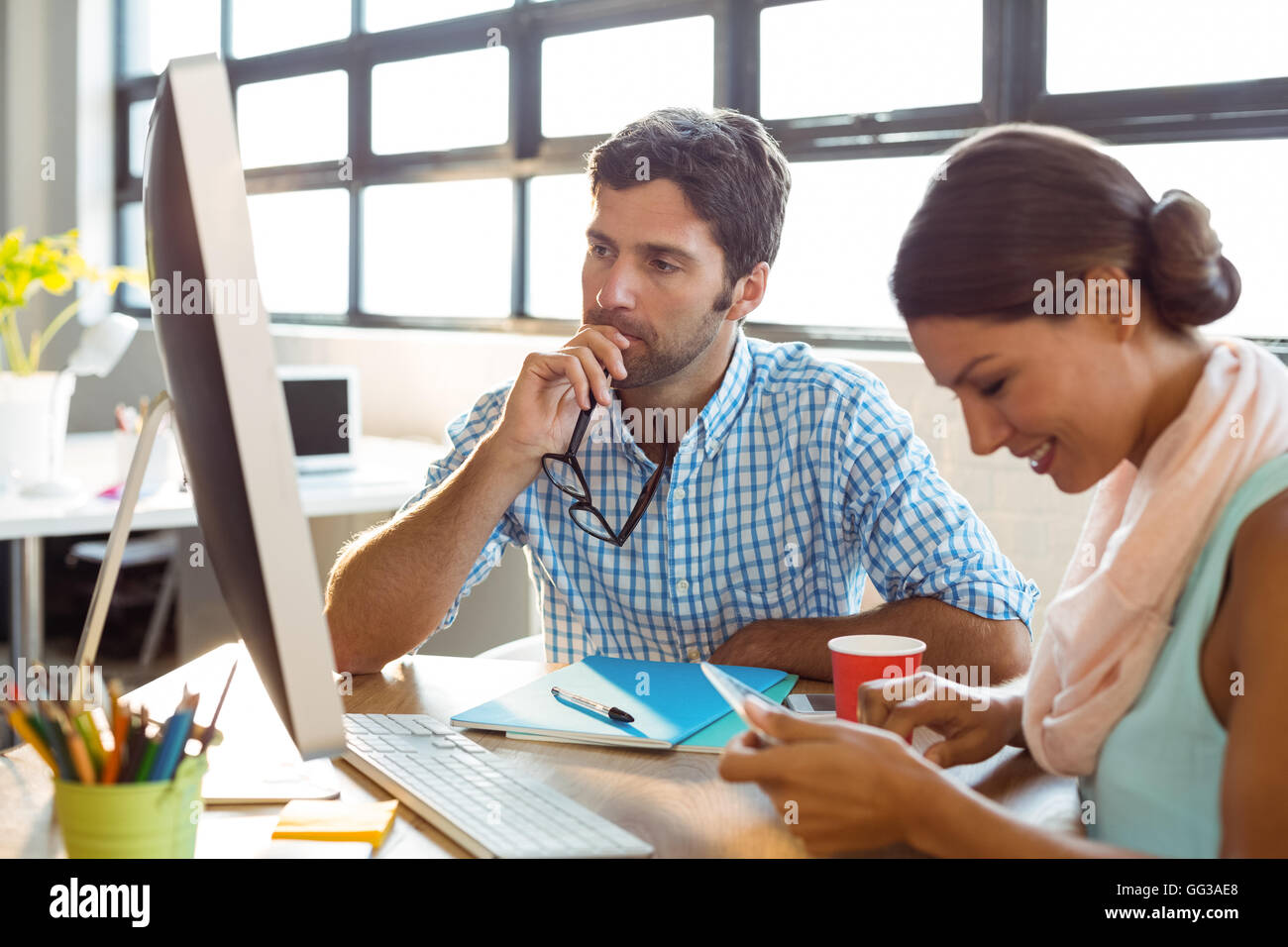 Business executive working in office Stock Photo - Alamy