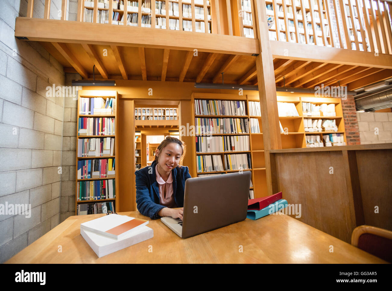 College library learning laptop hi-res stock photography and images - Alamy