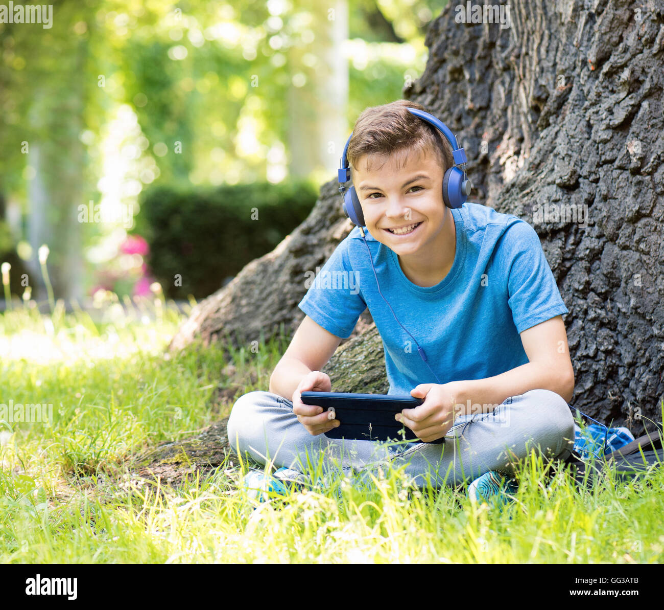 Boy with tablet Stock Photo - Alamy