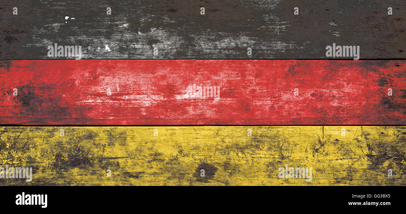 German flag painted on old wood plank background Stock Photo - Alamy