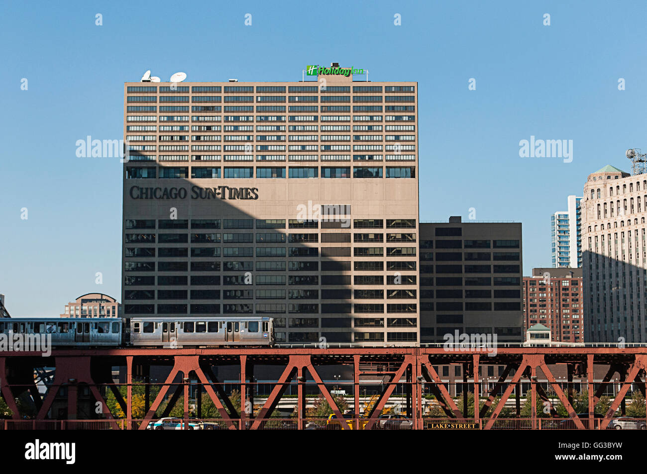 A train passing in front of the Chicago Sun Times building in downtown ...