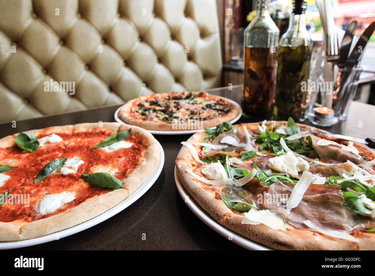 Pictures of people eating and being served pizza at Bush Hall's ...