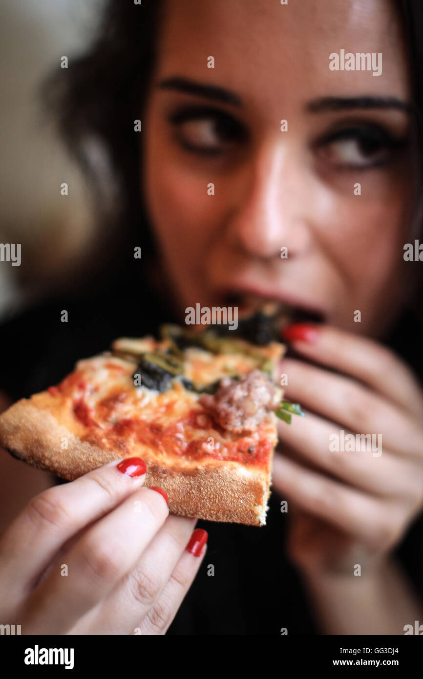 Pictures of people eating and being served pizza at Bush Hall's ...