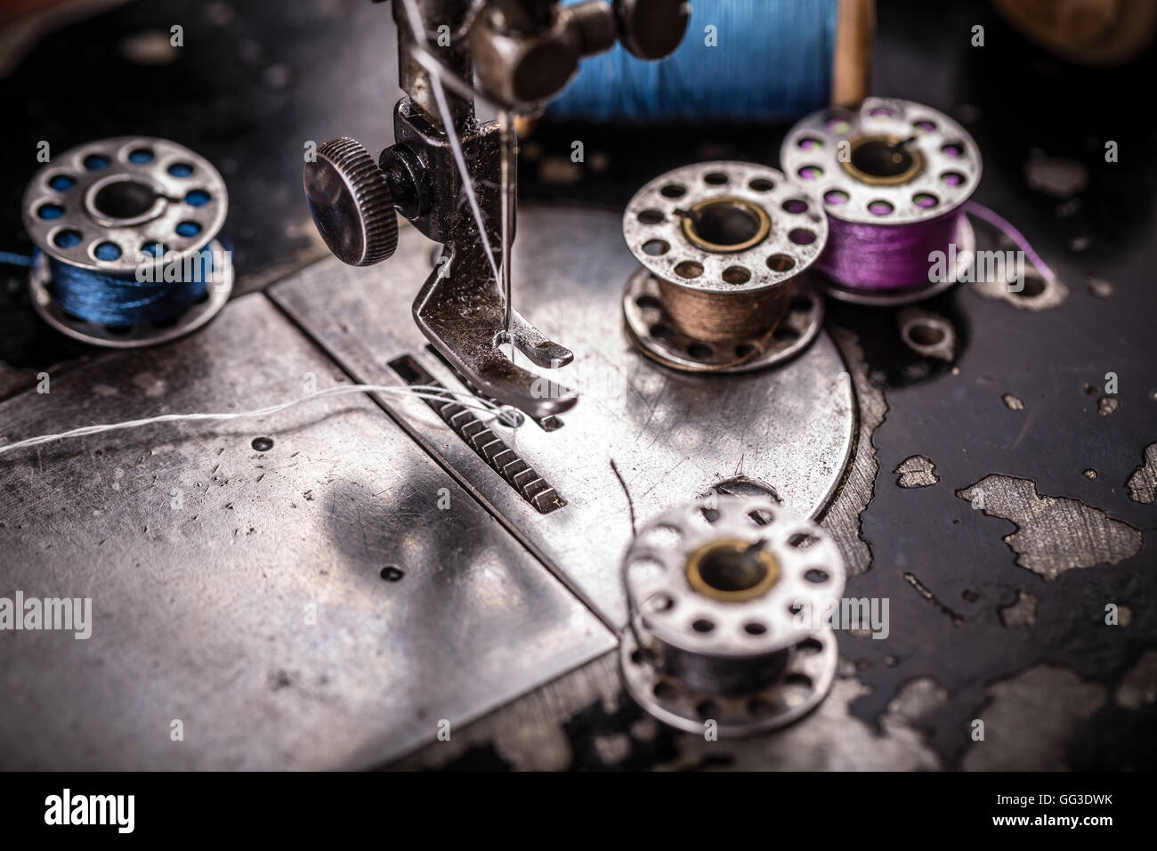 Detail of sewing machine and sewing accessories Stock Photo - Alamy