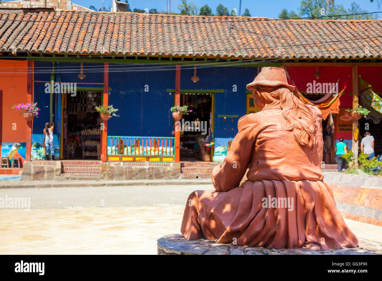 Clay woman statue at the Raquira city square Stock Photo - Alamy