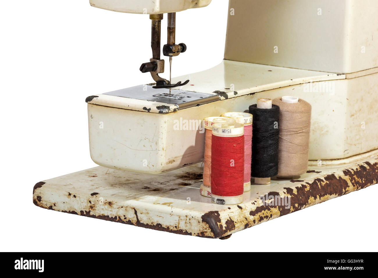 Close up side view of arm of rusted old sewing machine with different ...
