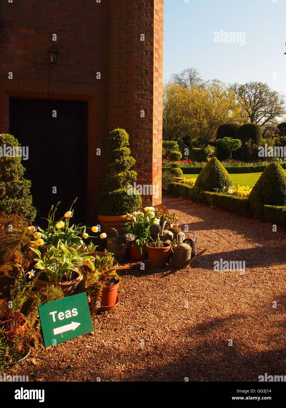 Portrait view of shingle path to Chenies Manor garden showing corner of ...