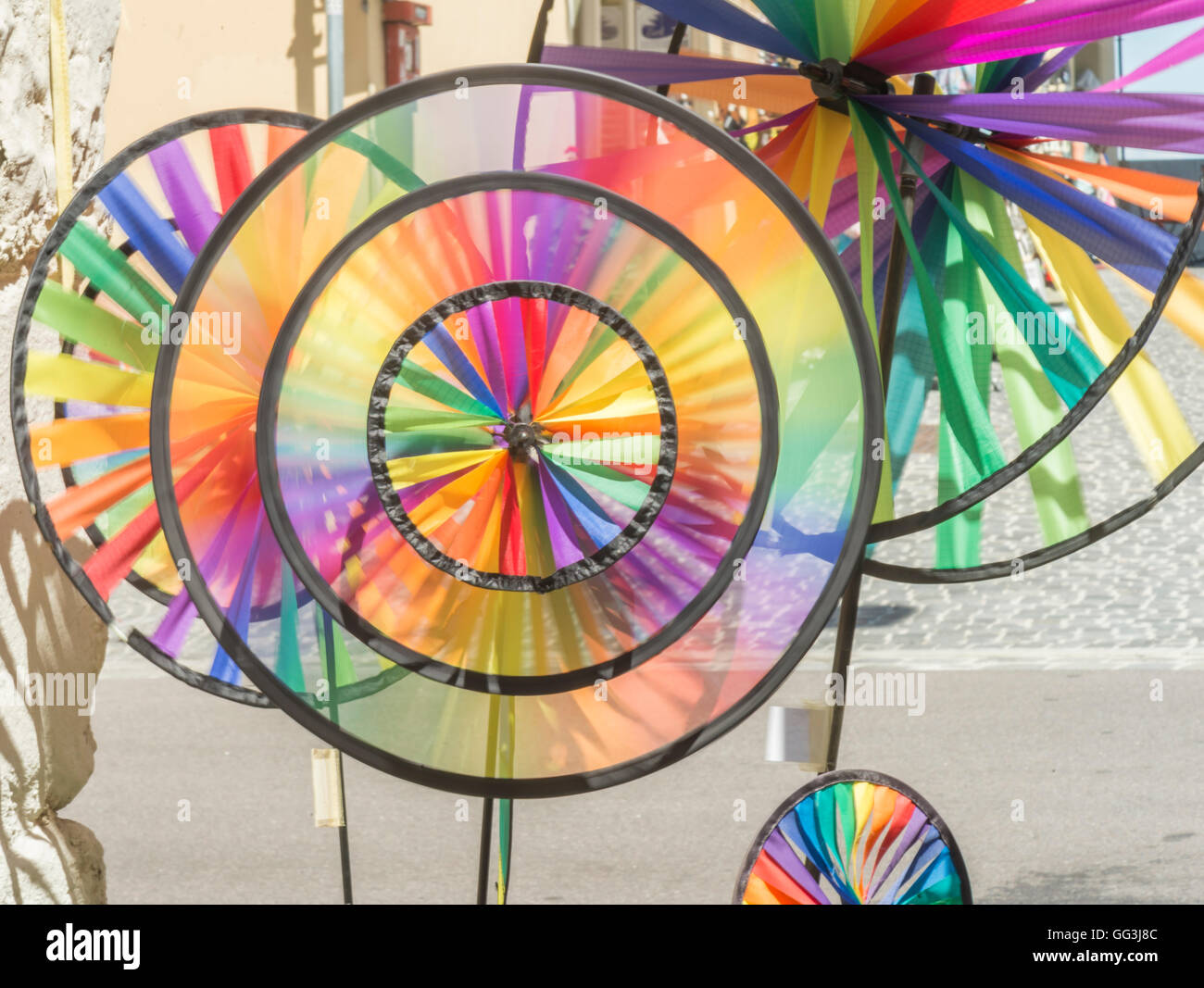 Closeup of spinning colored wind wheels outdoor Stock Photo - Alamy