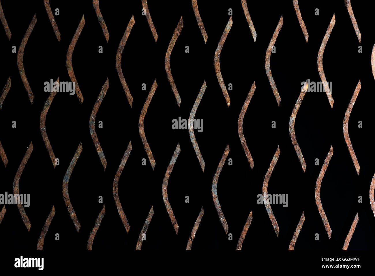 Texture or background of rusty expanded metal on black background Stock ...