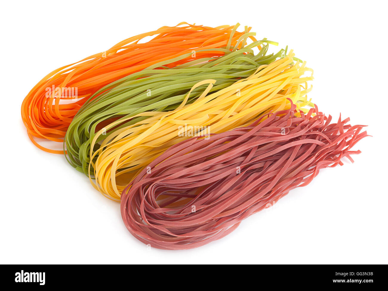 Wheat multicolored noodles isolated on white background Stock Photo - Alamy