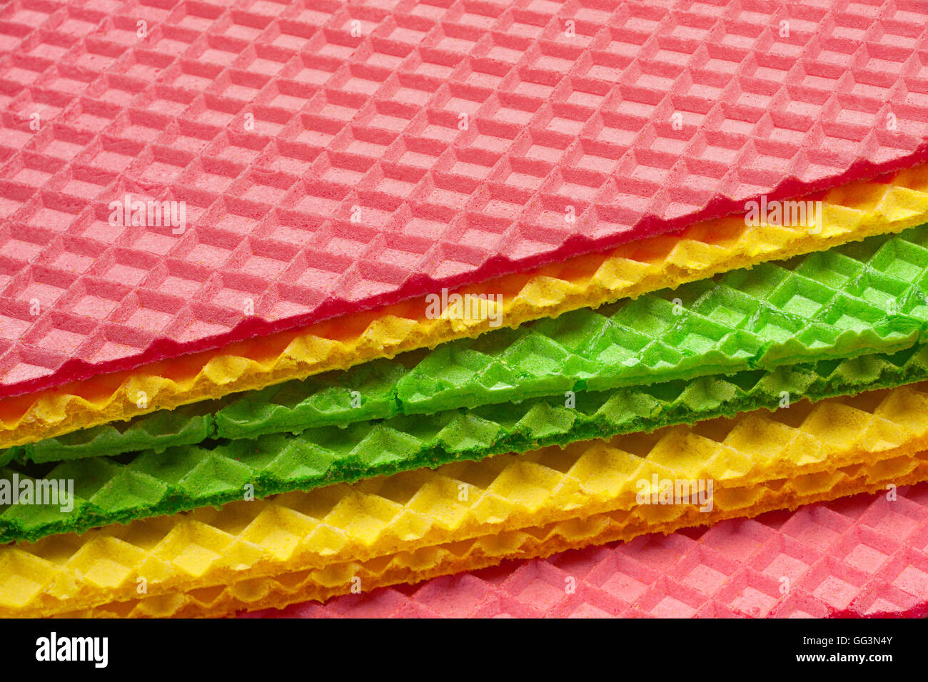 Multicolor wafer textured surface closeup background Stock Photo - Alamy