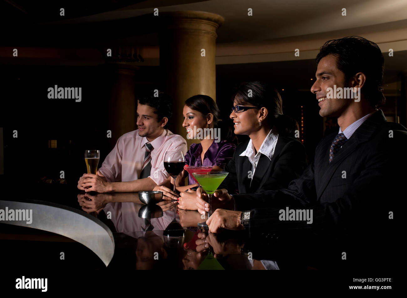 Executives at the bar Stock Photo - Alamy