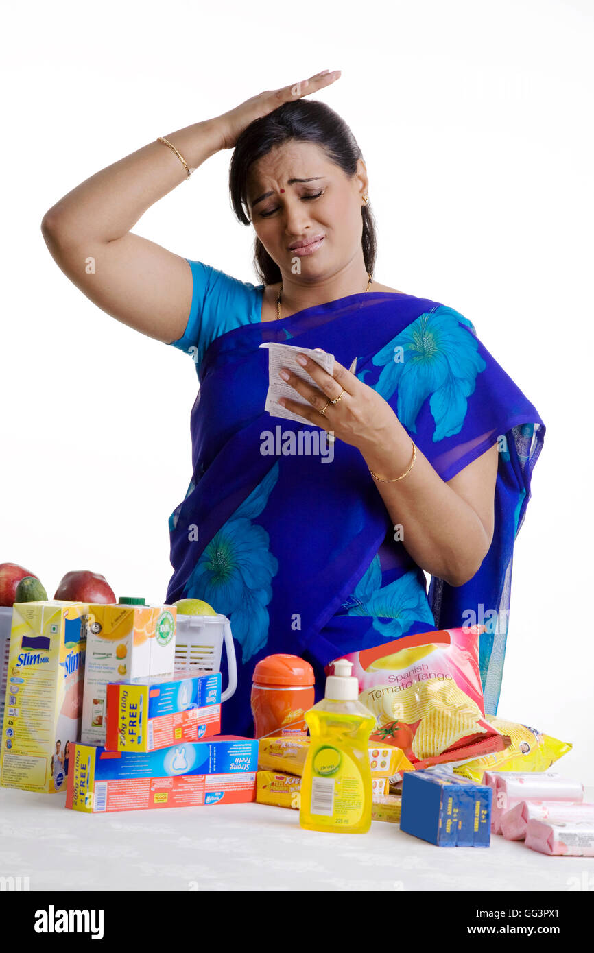 Reacting to the huge bill Stock Photo - Alamy