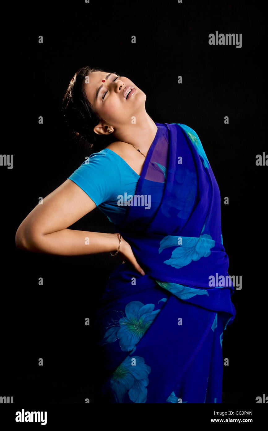 Woman with a backache Stock Photo - Alamy