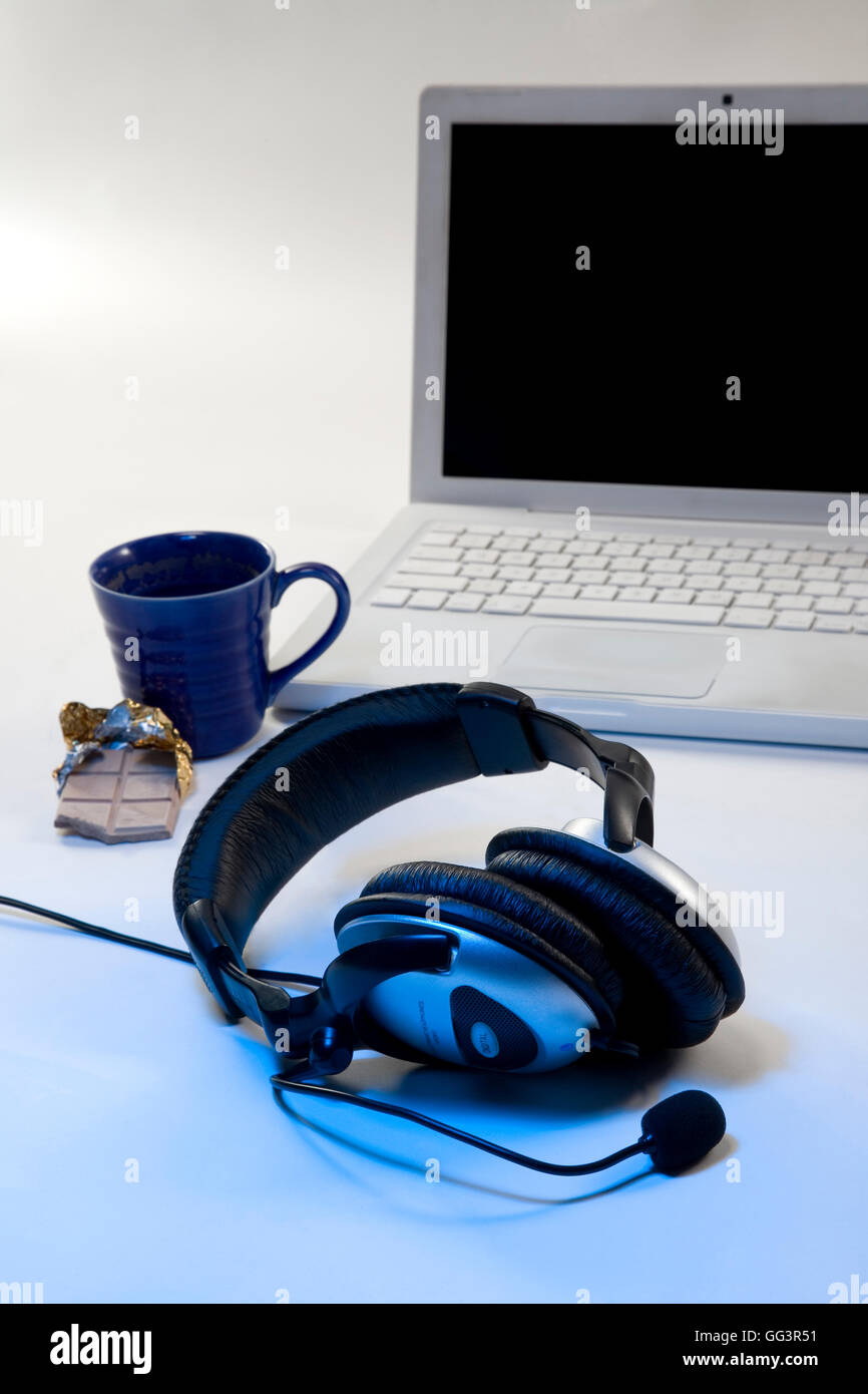 Laptop with headphones Stock Photo - Alamy