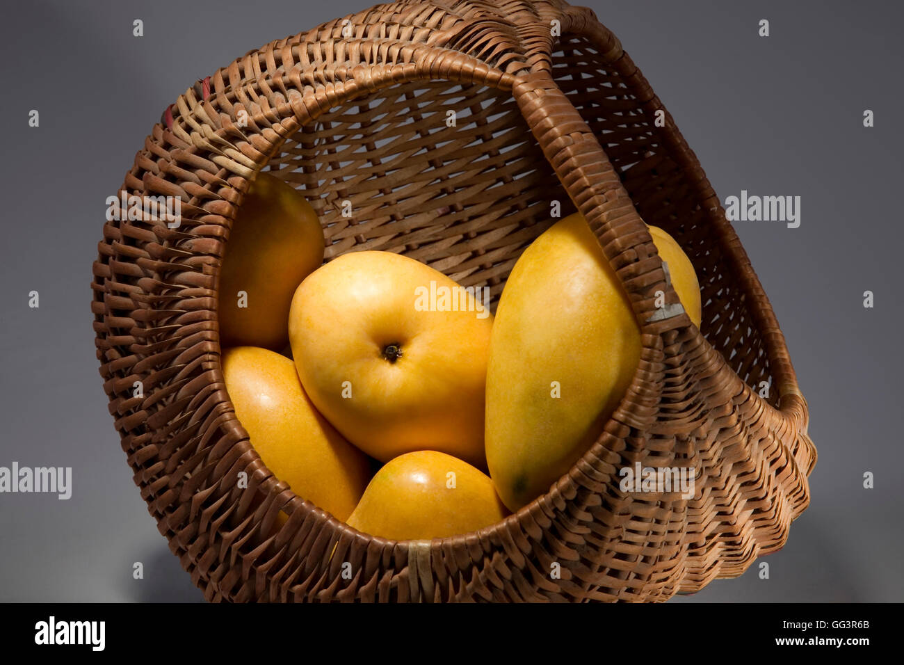 Mango in basket hi-res stock photography and images - Alamy