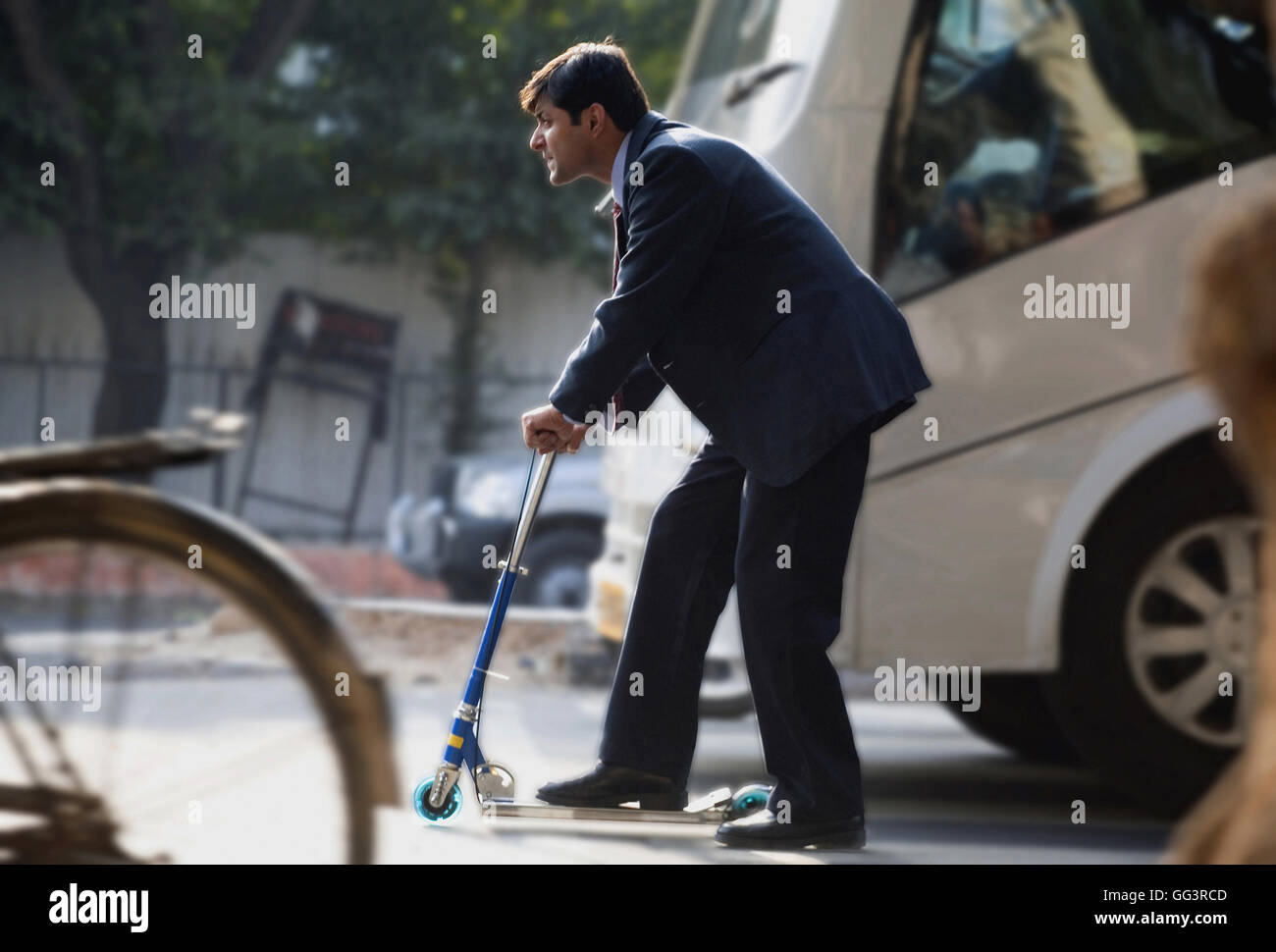 Man on a jus start cycle Stock Photo - Alamy